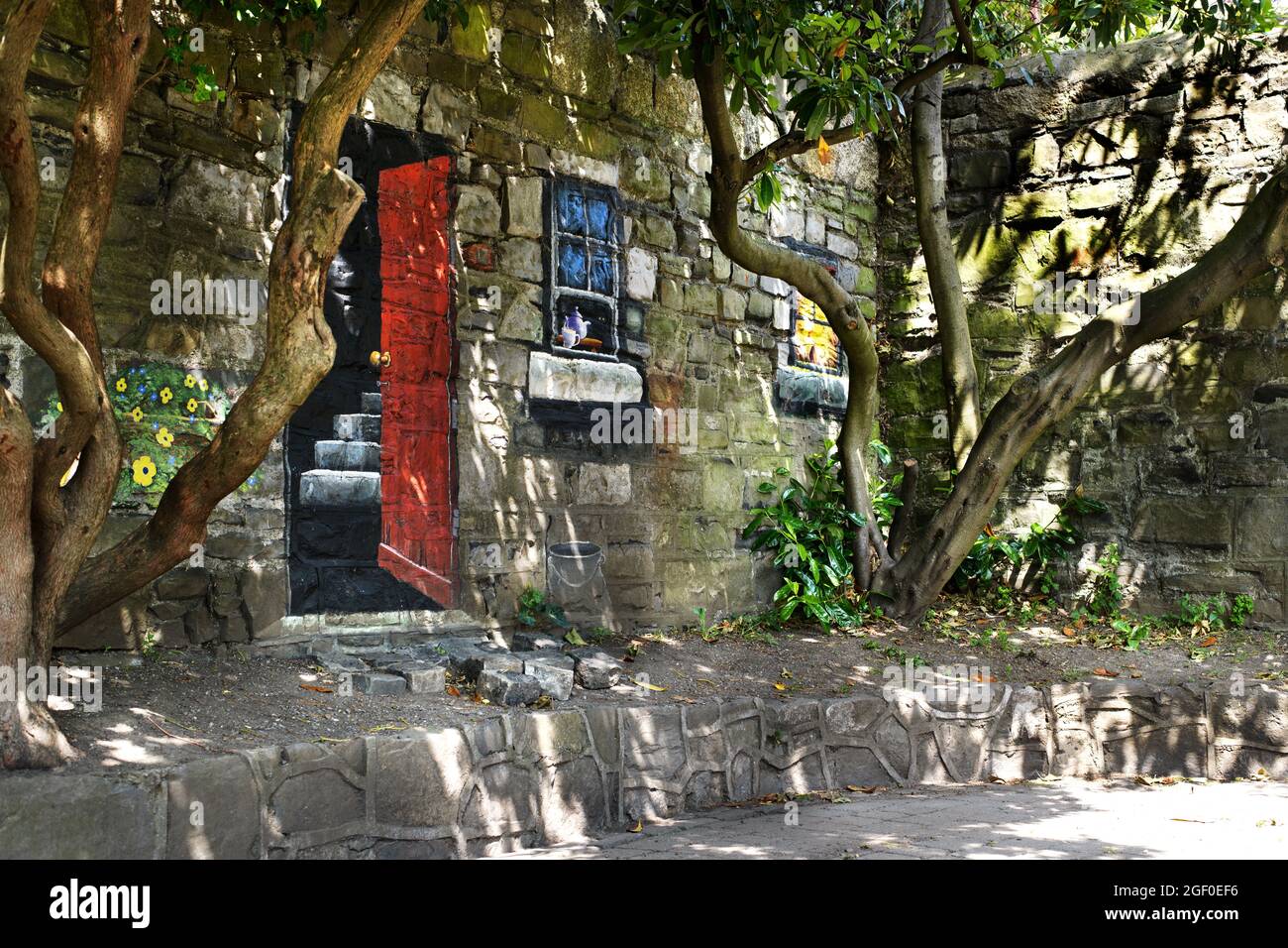 Painted front door and window of old Irish house on a cottage wall ...
