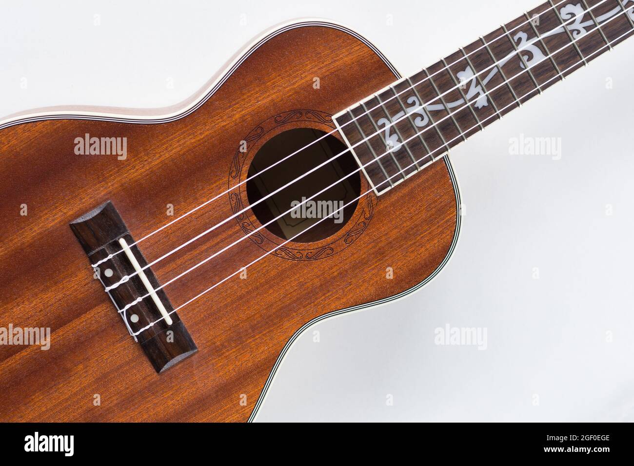 Body of ukulele on white background Stock Photo - Alamy