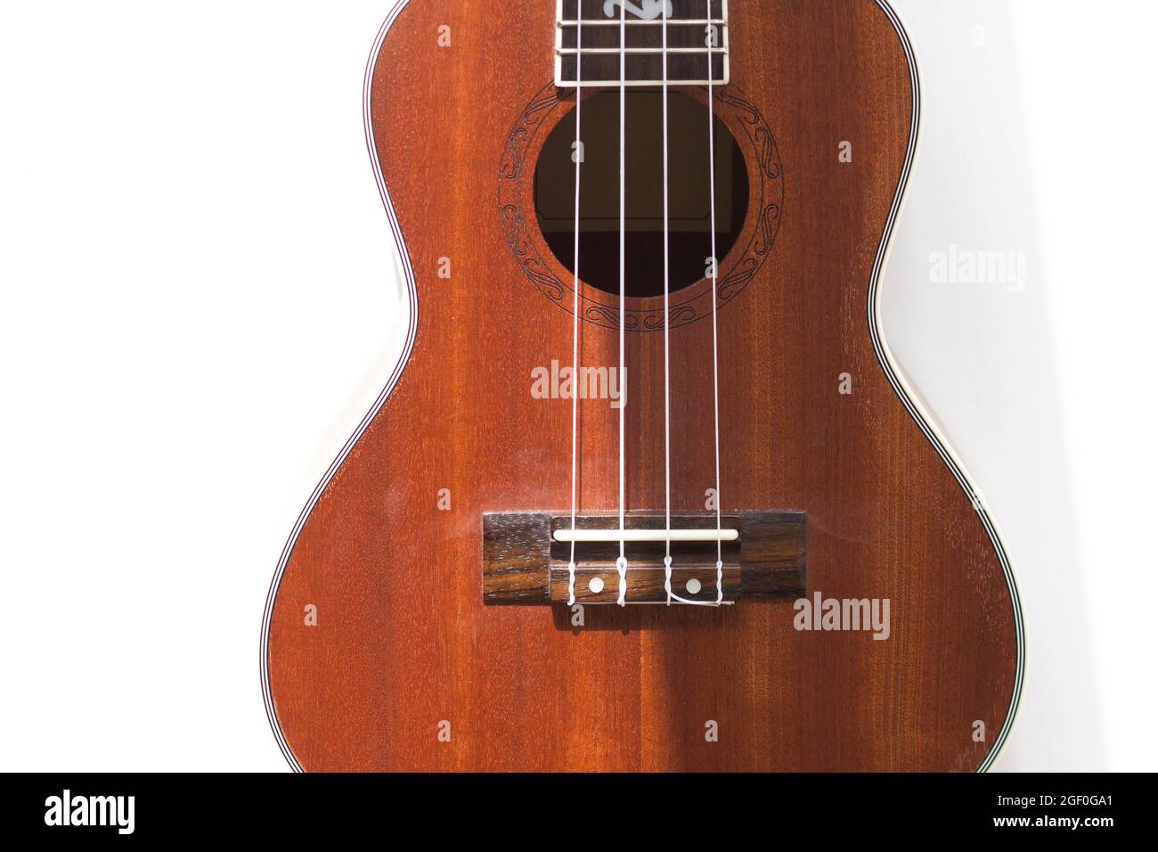 Body of ukulele on white background Stock Photo - Alamy