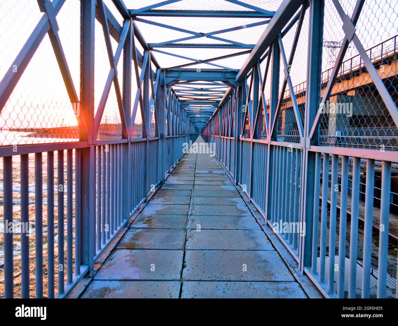 Bridge crossing, pedestrian overpass made of metal structures over the ...