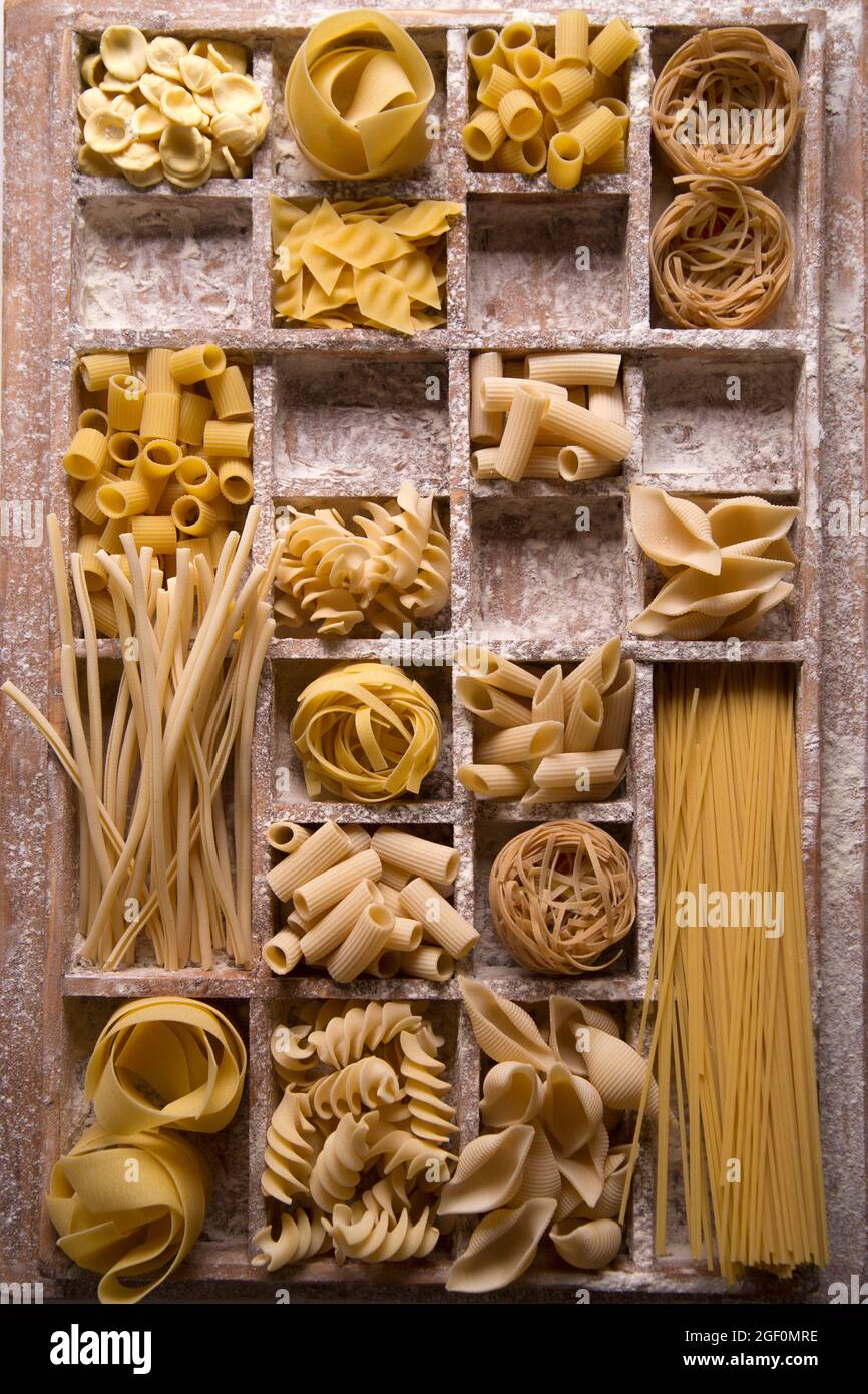Presentation of varieties of Italian pasta made with white flour Stock ...