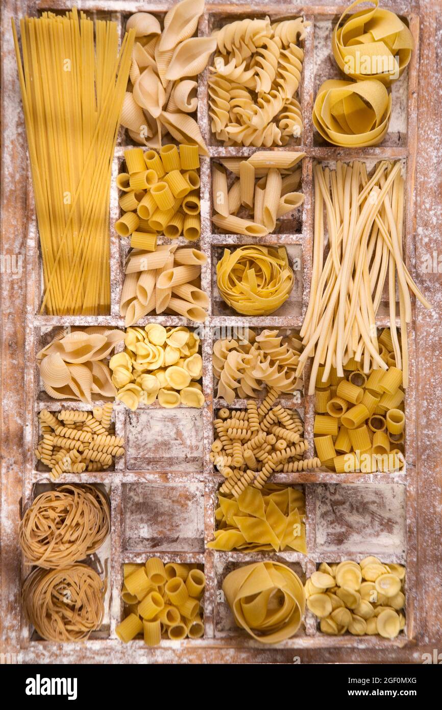 Presentation of varieties of Italian pasta made with white flour Stock ...