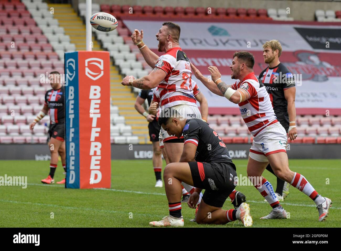 Adam Sidlow (20) of Leigh Centurions celebrates scoring a try to make ...
