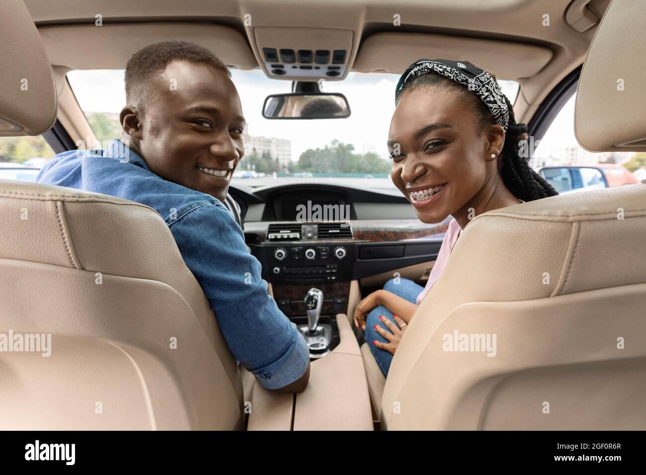 Woman driver man in backseat hi-res stock photography and images - Alamy