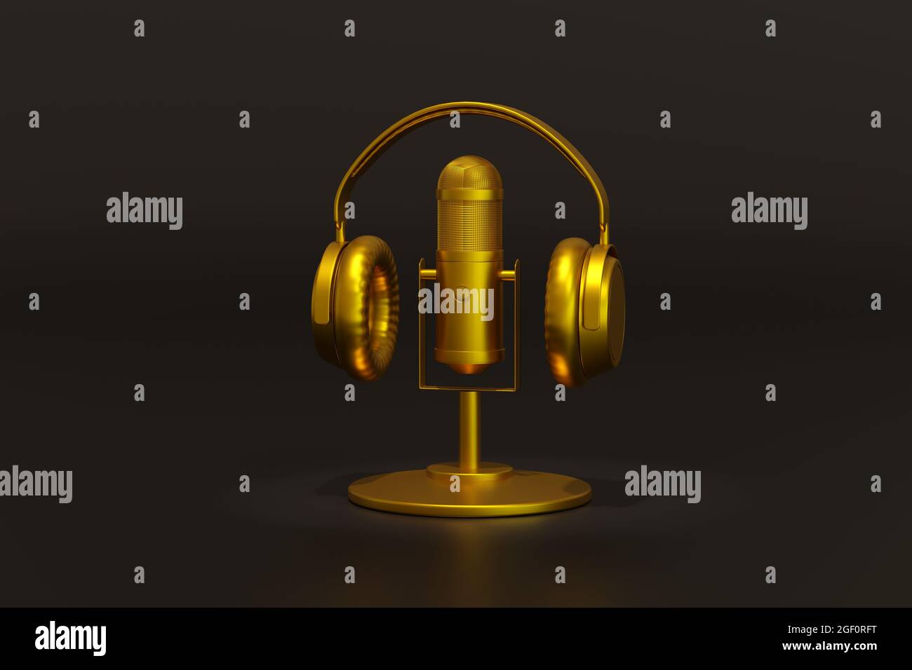 Golden Condenser microphone and headphones isolated on a dark ...