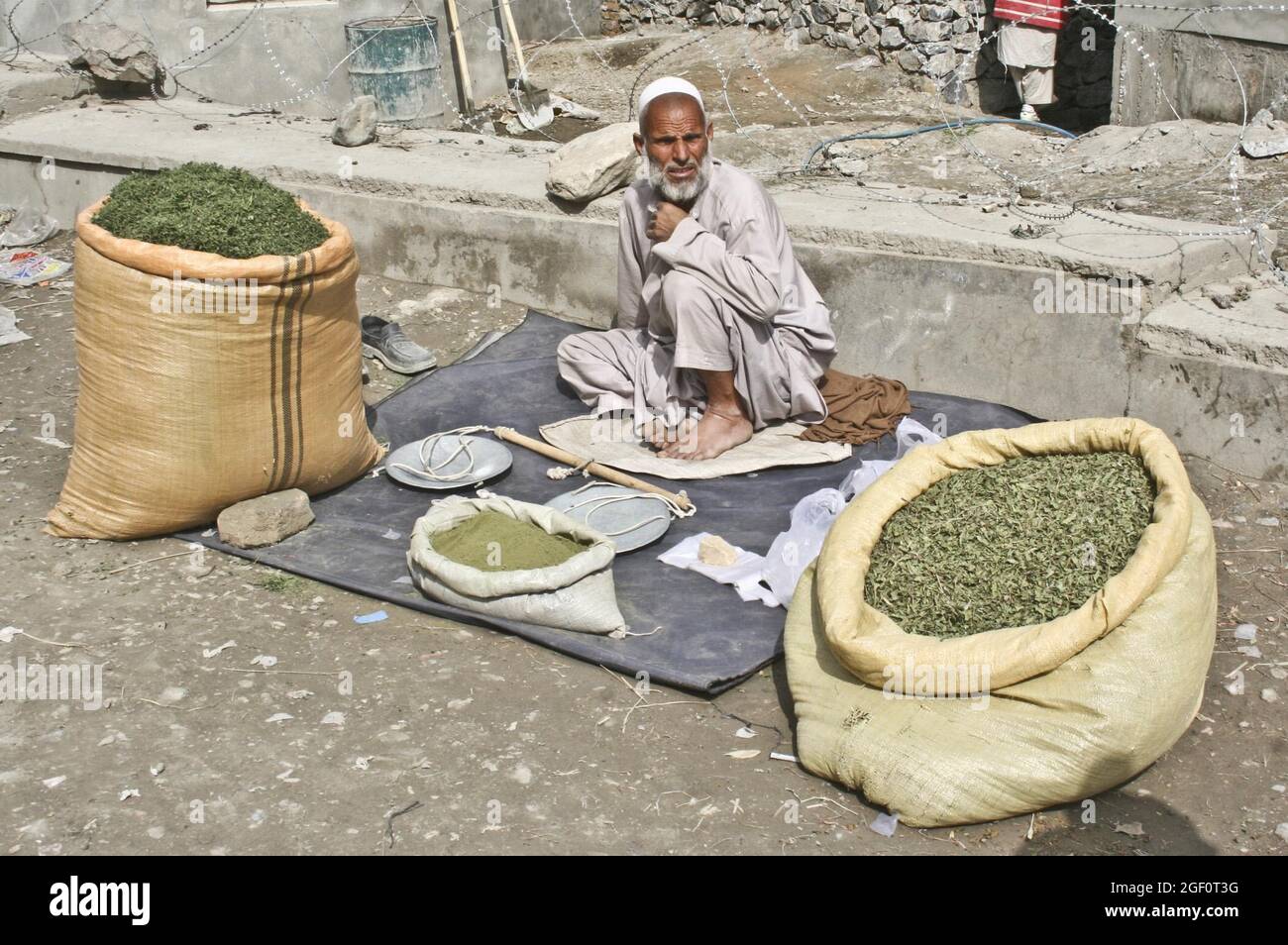 An Afghan merchant truck sells henna along the pedestrian walkway March ...