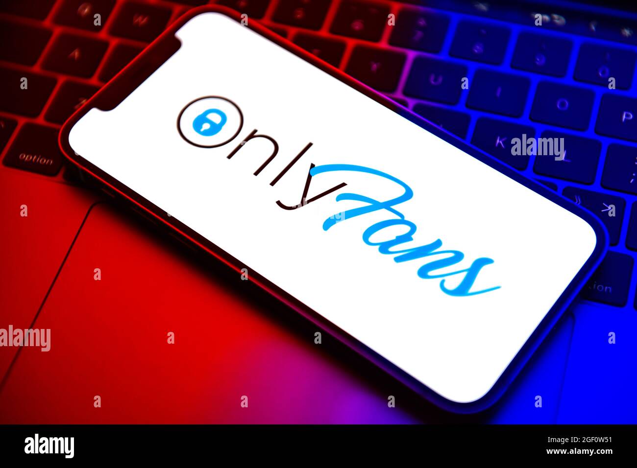 In this photo illustration, an OnlyFans logo seen displayed on a ...