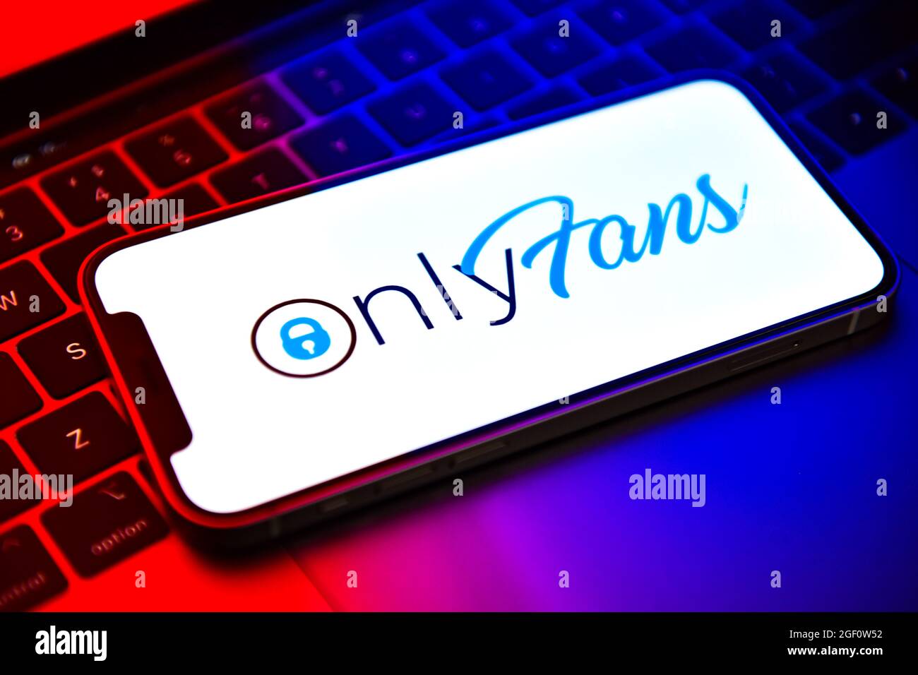 Onlyfans Logo Is Seen Displayed On A Phone Screen In This OnlyFans To