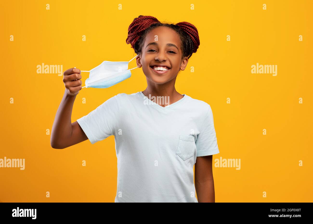 Cheerful african girl taking hi-res stock photography and images - Alamy