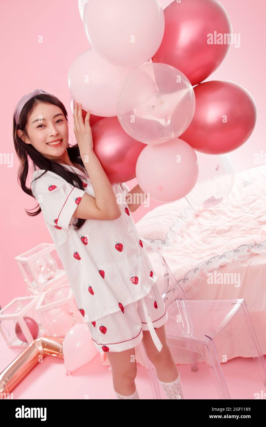 Beautiful young girls and balloons Stock Photo - Alamy