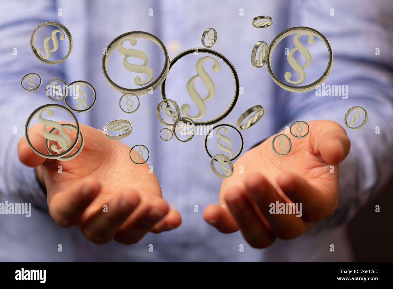 A man holding the virtual symbol of law and justice in 3D Stock Photo ...