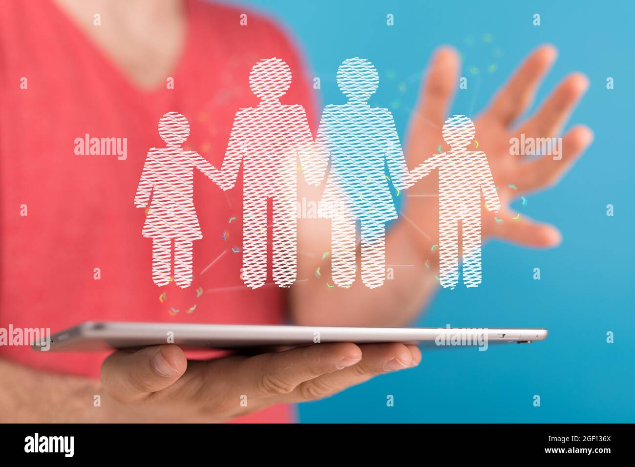 A 3D rendering of family members silhouettes over a tablet in a person ...