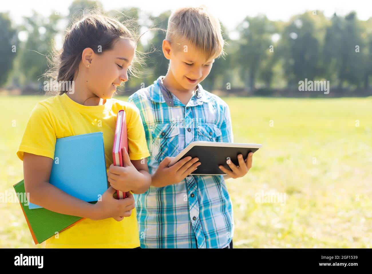 Two boys walking together school hi-res stock photography and images ...