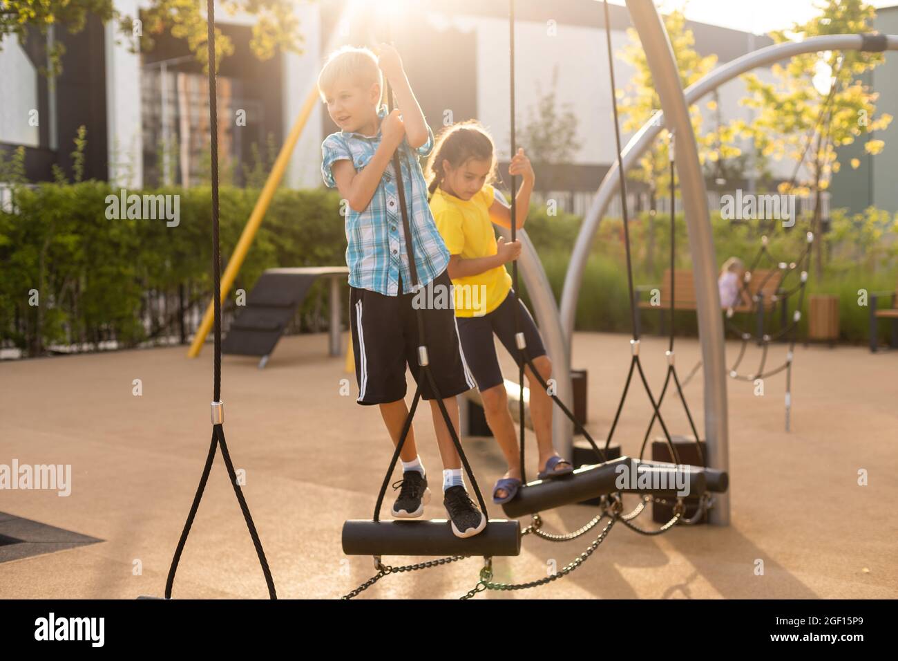 elementary aged children in the playground Stock Photo - Alamy