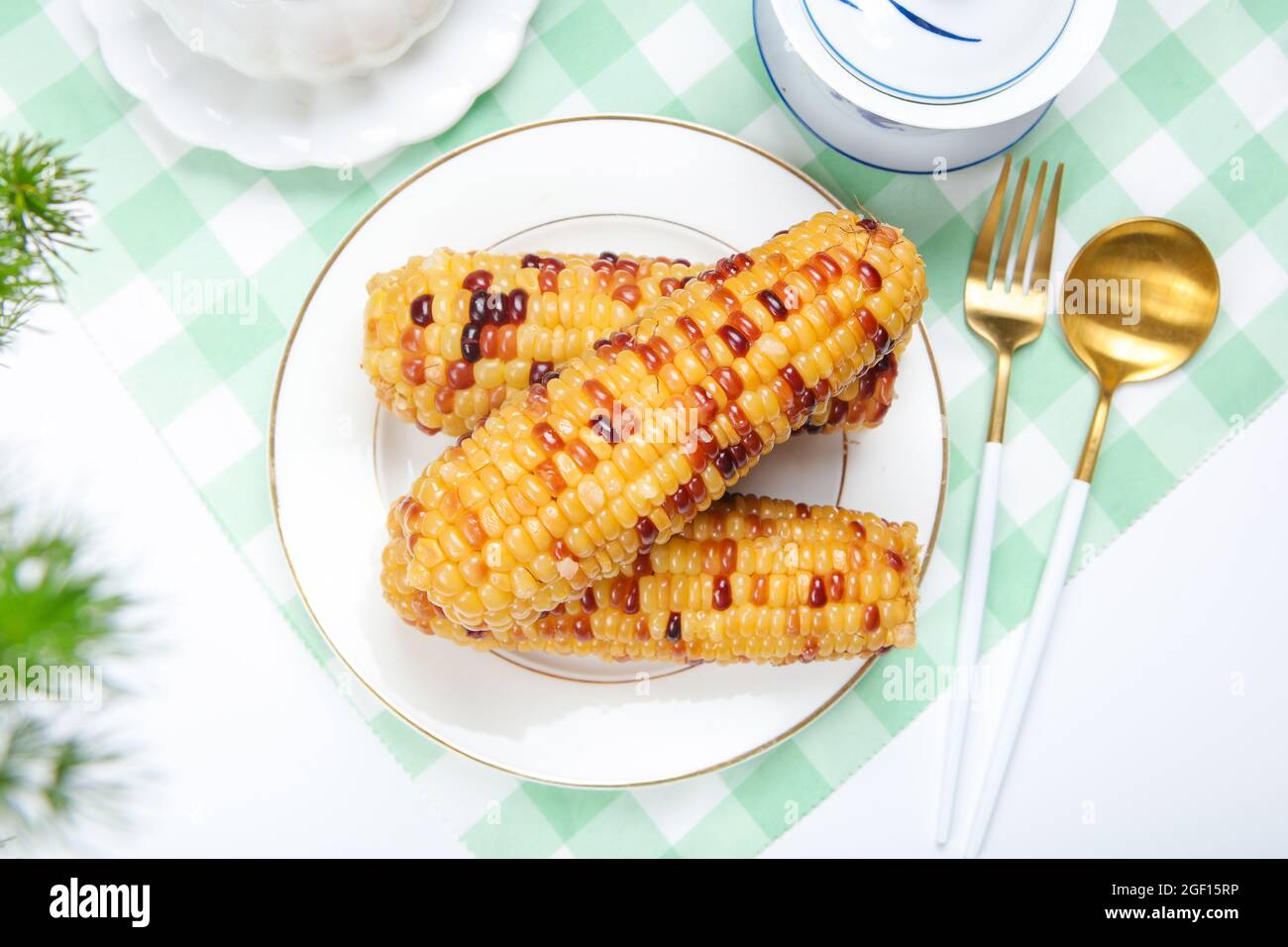 Take the corn Stock Photo - Alamy