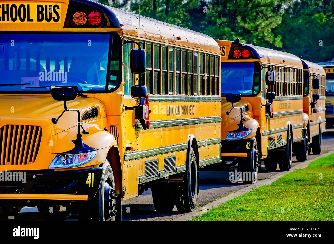 School buses are lined up outside South Hancock Elementary School, Aug ...