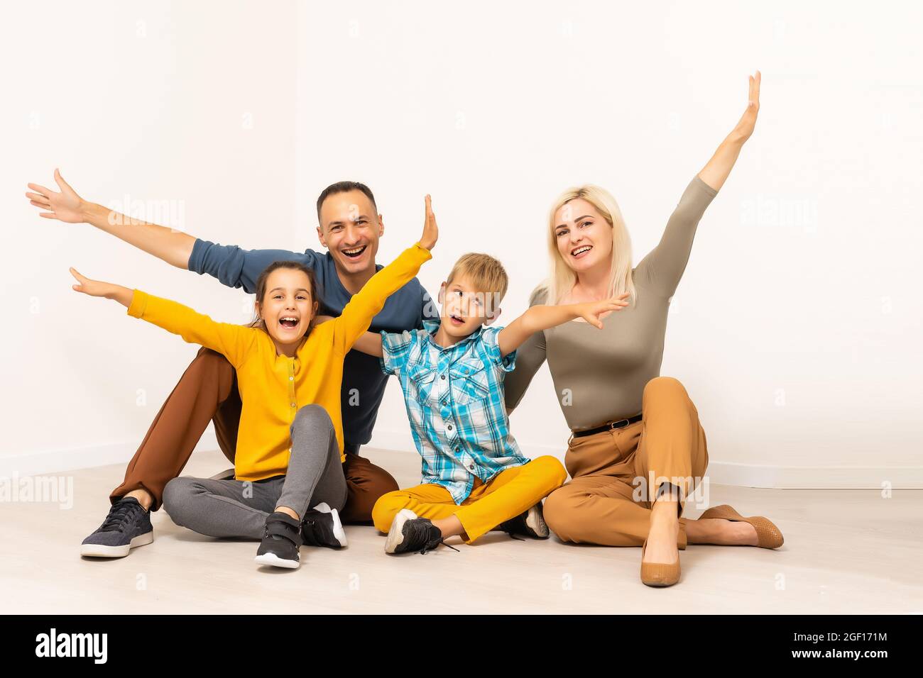 Family with children on a white background Stock Photo - Alamy