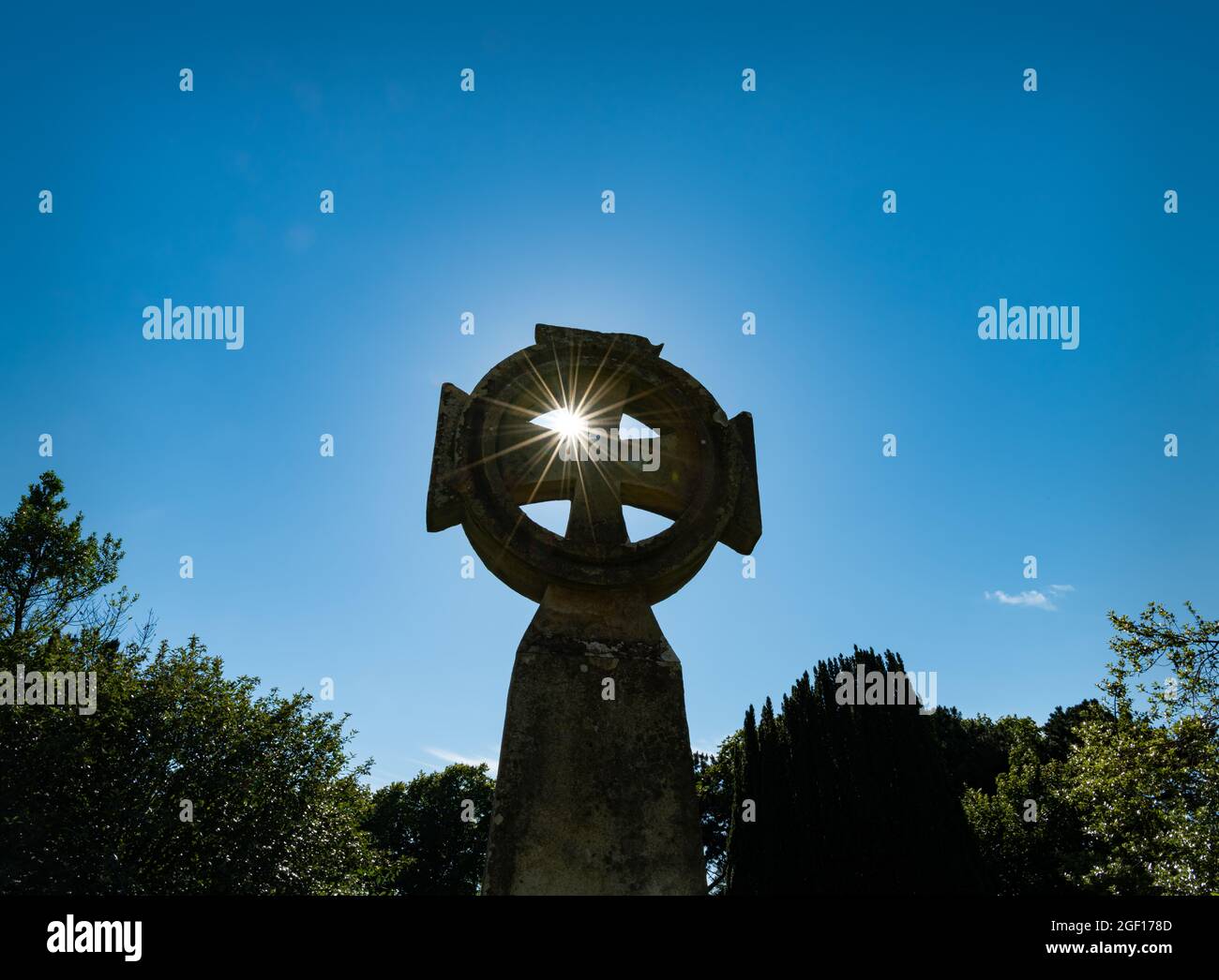 Celtic Cross with sun star burst through the upper left hand quadrant ...