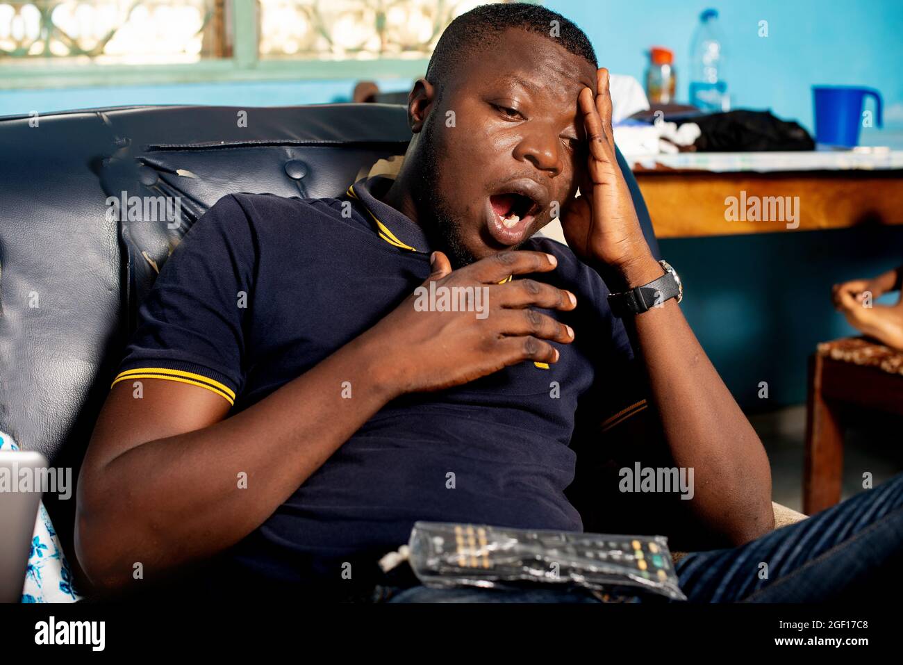 Man dozing in armchair hi-res stock photography and images - Alamy
