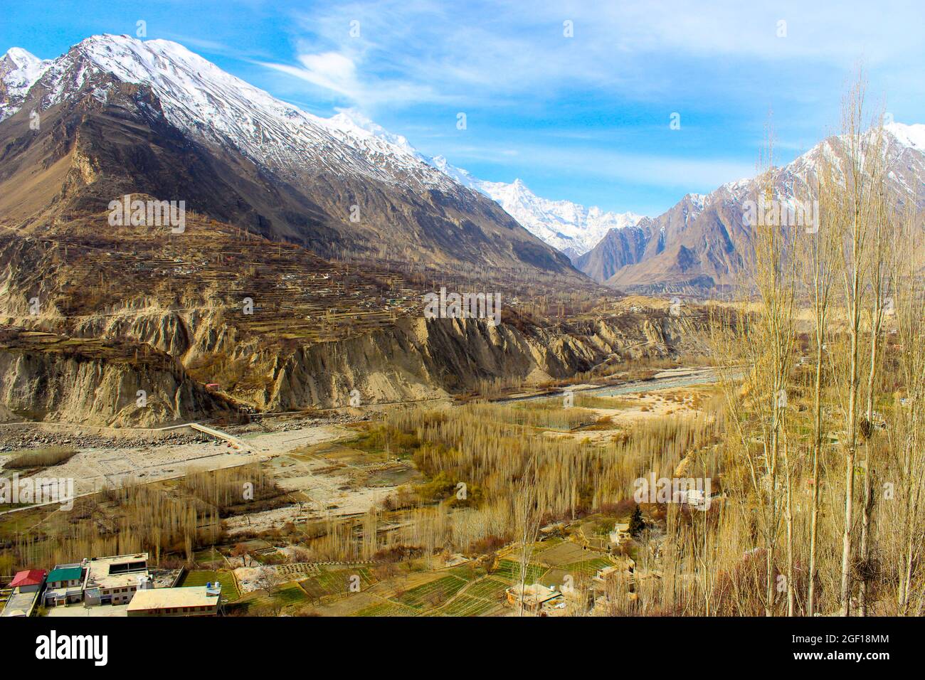 A half-dried river flowing through the mountainous Hunza valley, Gilgit ...