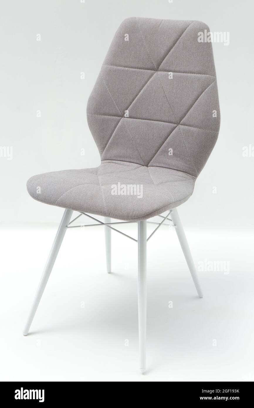 Gray soft chair on an isolated white background Stock Photo - Alamy