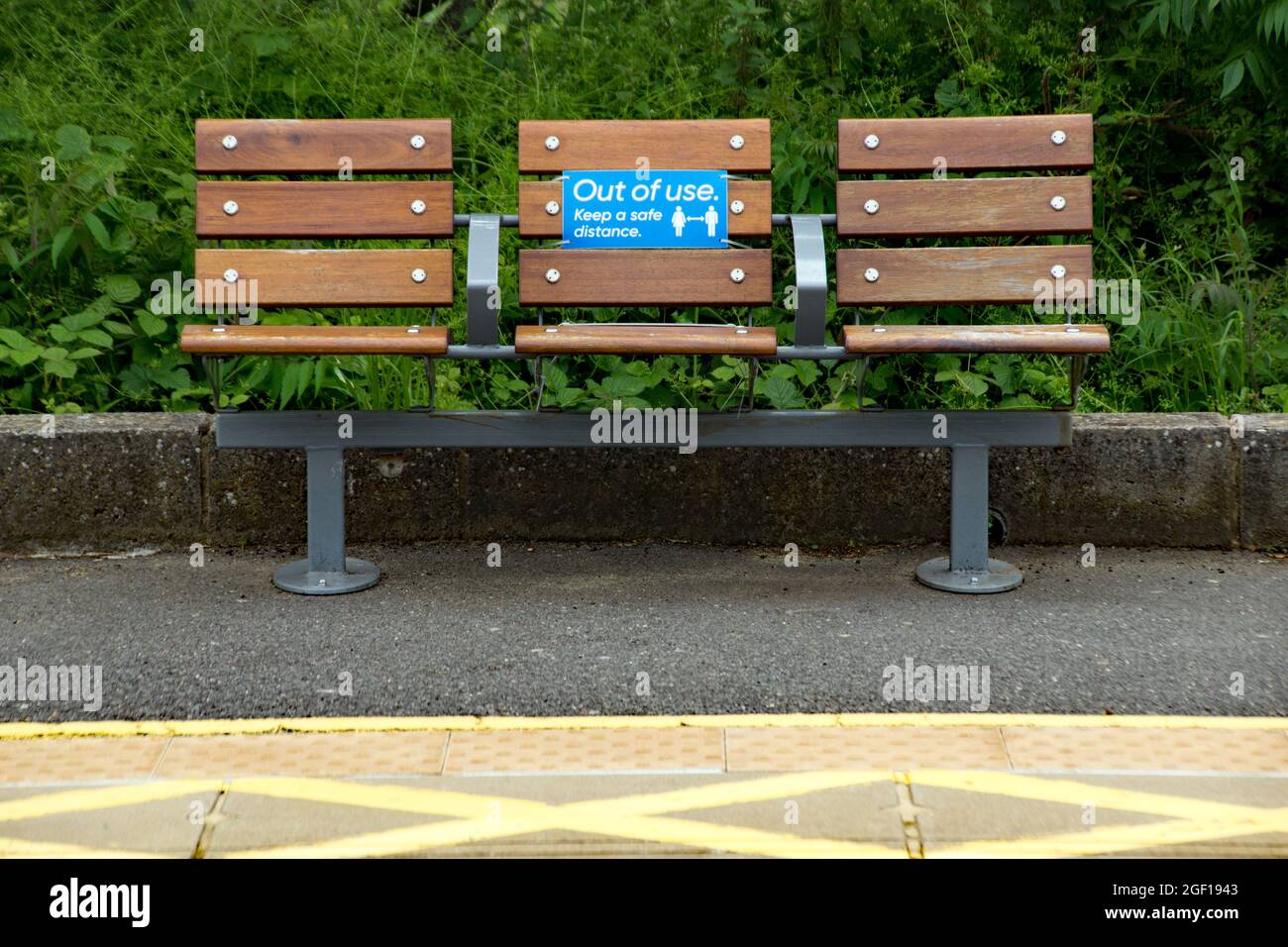 A covid-19 safe seating arrangement at a rail station in Hertfordshire ...