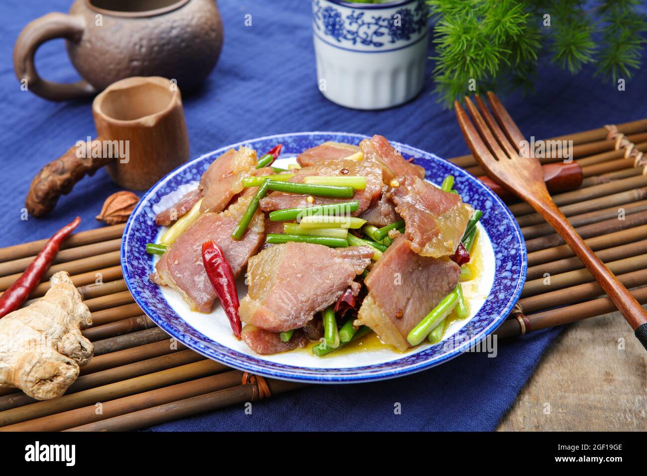 Ham Fried garlic moss Stock Photo - Alamy