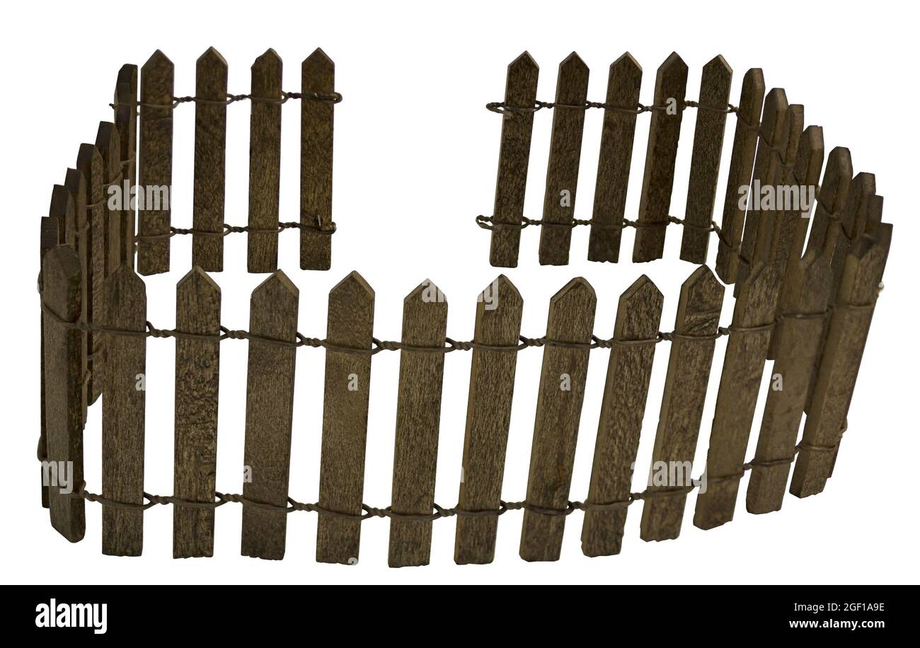 A while picket fence intertwined with wire Stock Photo - Alamy