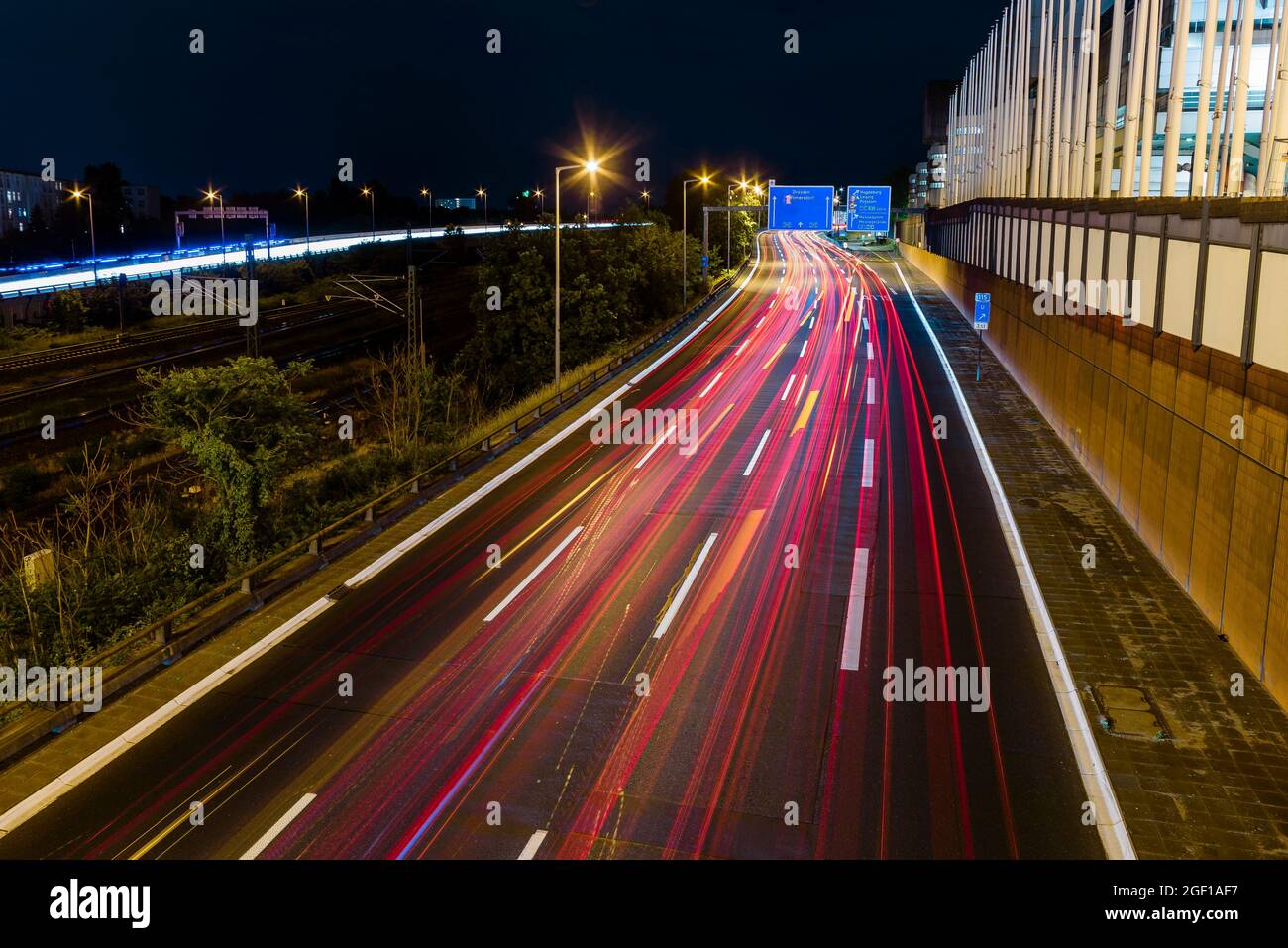 traffic on highway at night with light trails, Autobahn in Berlin at ...