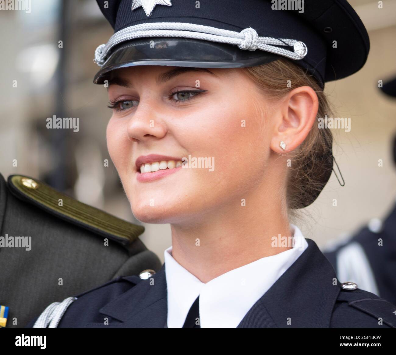 Lovely girl police officer participate in a rehearsal of military ...