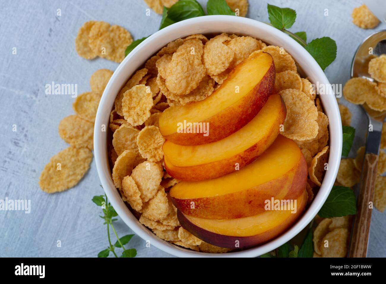 A delicious Breakfast cereal and peach Stock Photo - Alamy