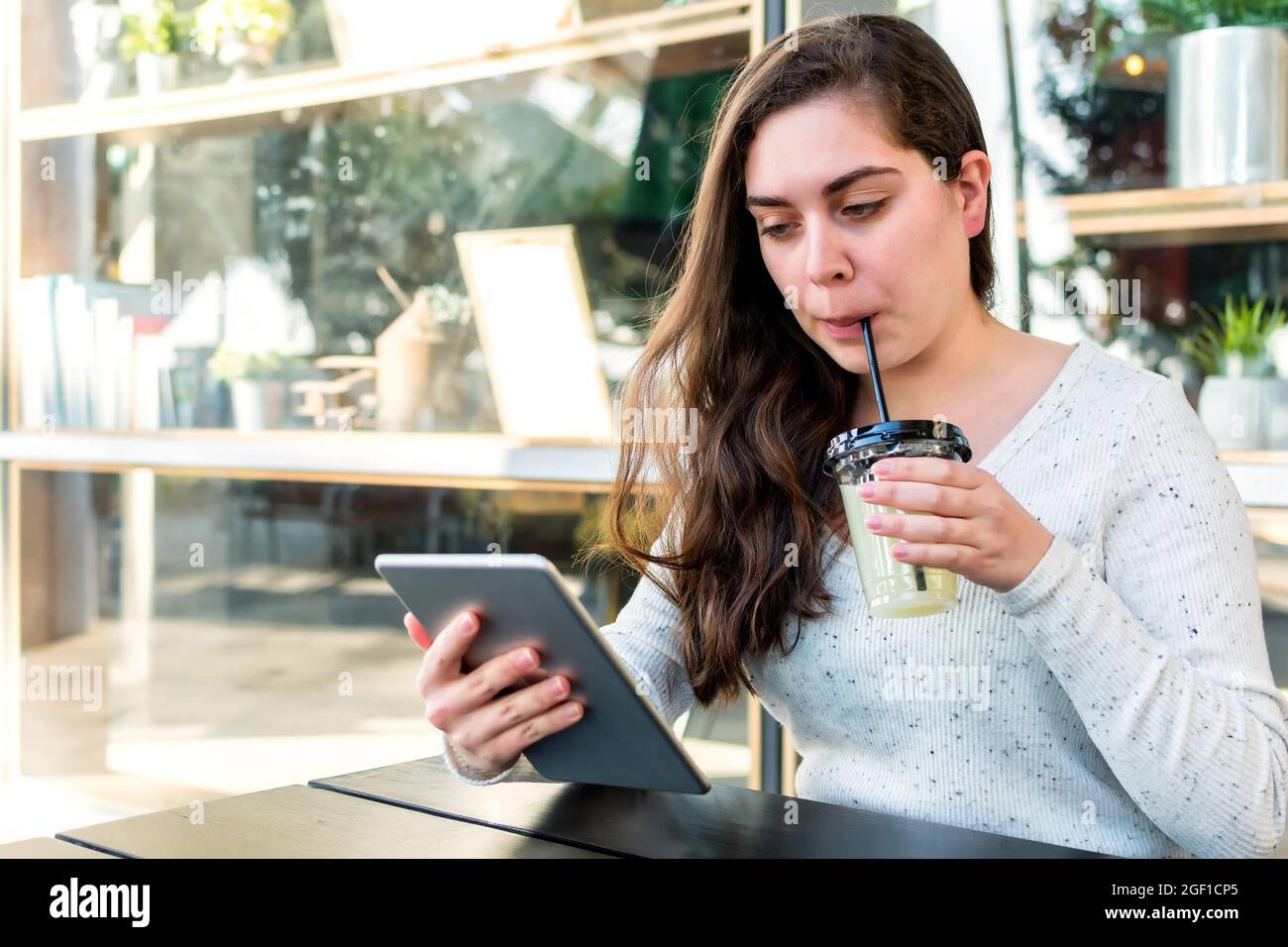 Taking a sip of juice hi-res stock photography and images - Alamy