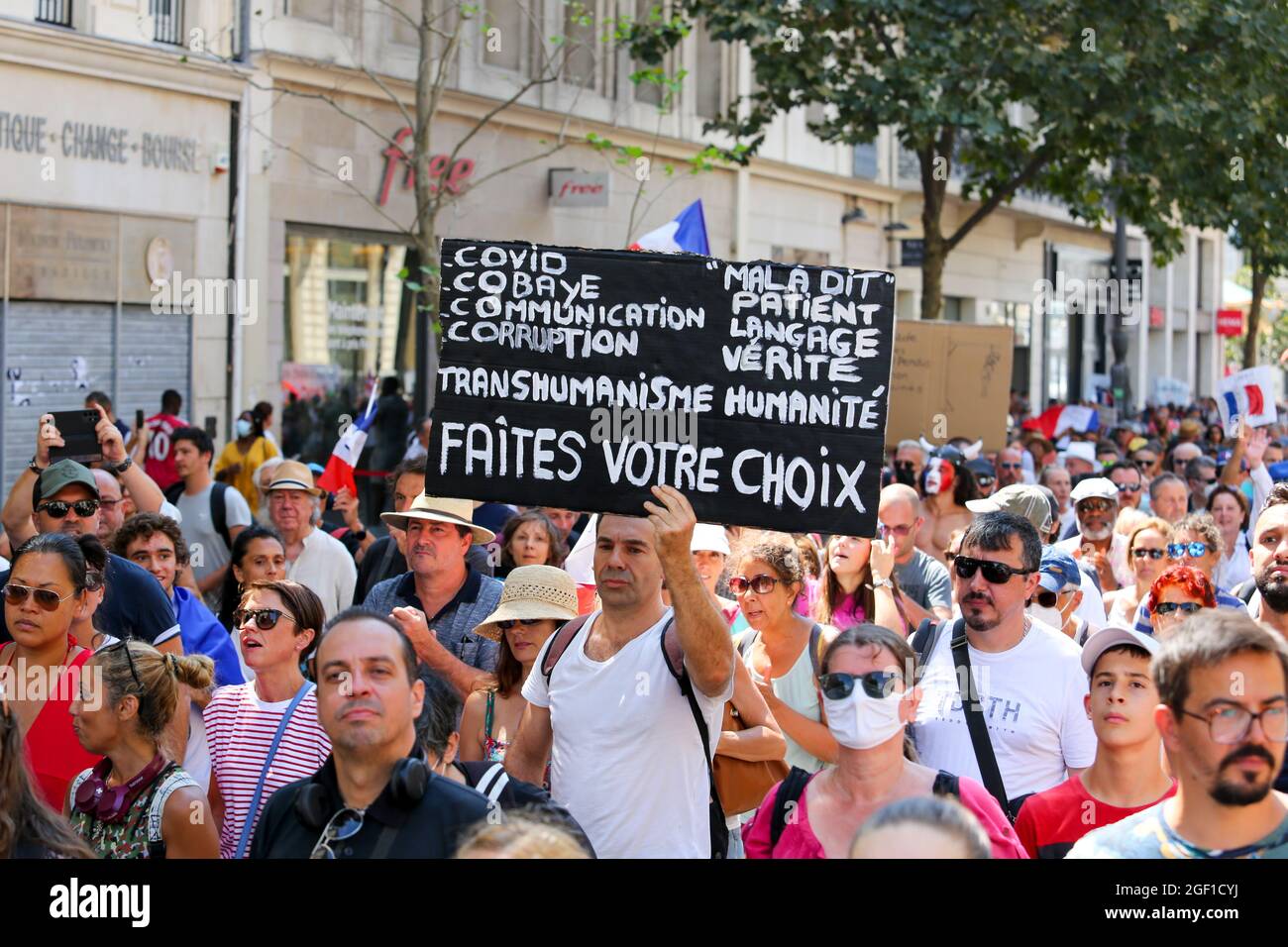 Marseille, France. 21st Aug, 2021. A protester holds a placard during ...