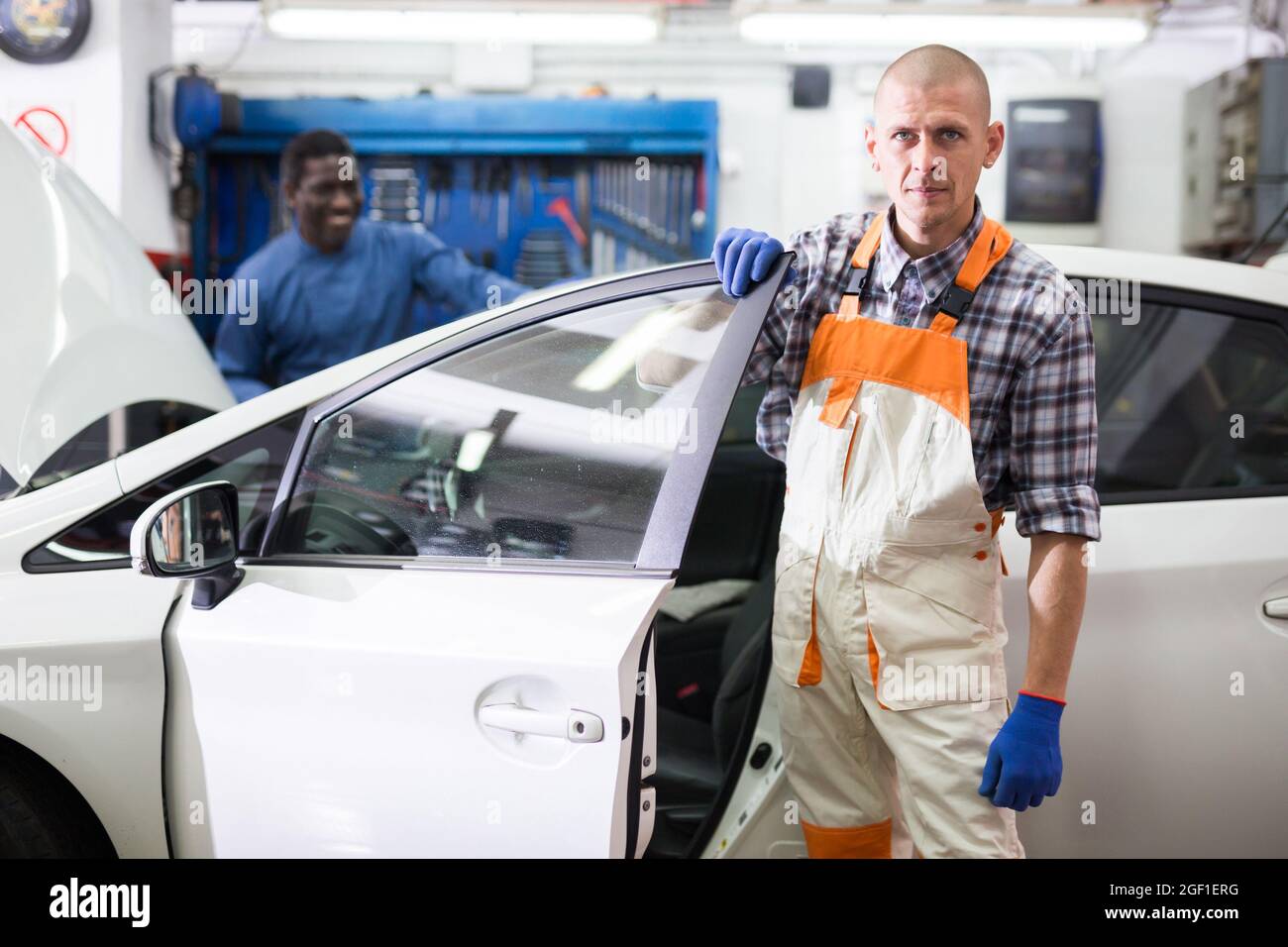 Portrait experienced auto mechanic in hi-res stock photography and ...