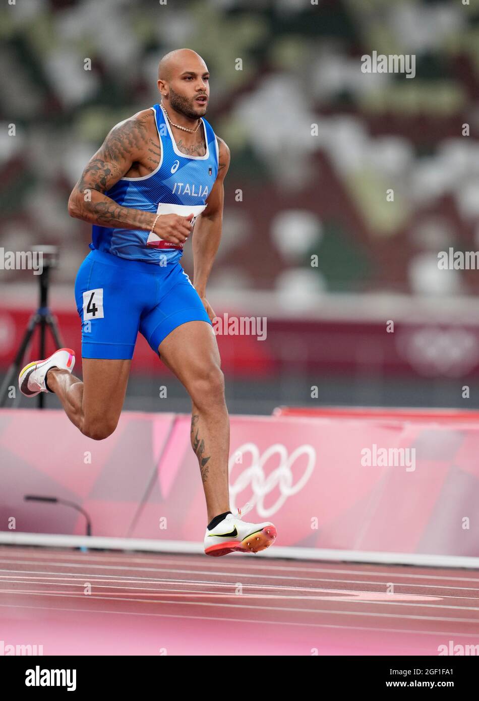 Marcell Jacobs running the 100 meters at the 2020 Tokyo Olympics Stock ...