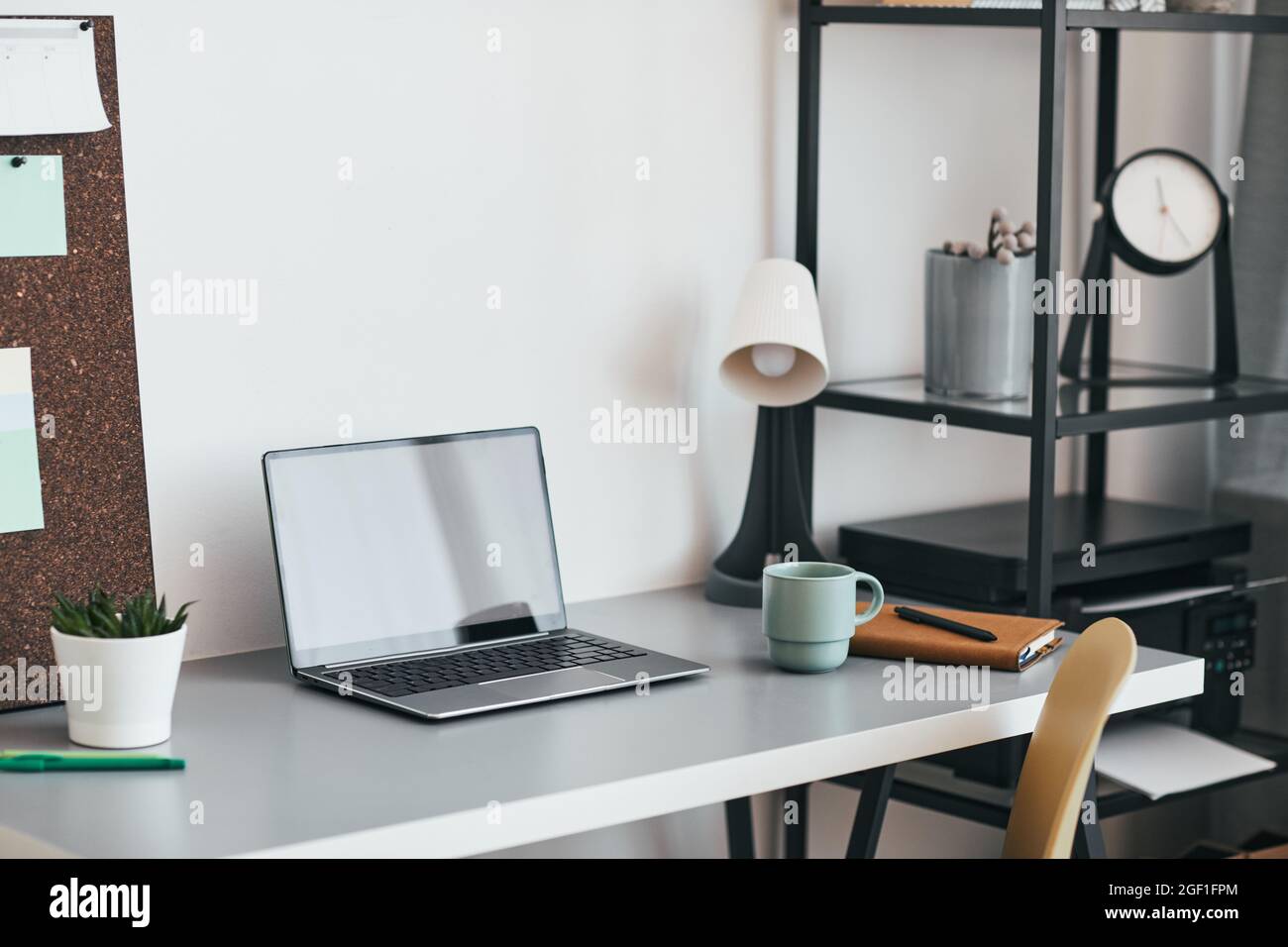 Clean background image of minimal home office workplace with laptop and ...