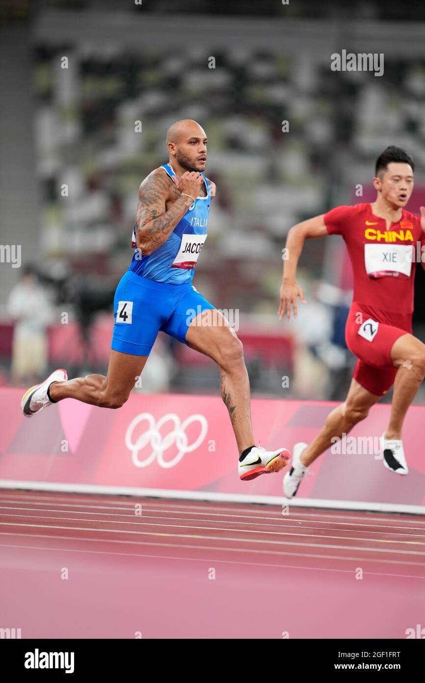 Marcell Jacobs running the 100 meters at the 2020 Tokyo Olympics Stock ...