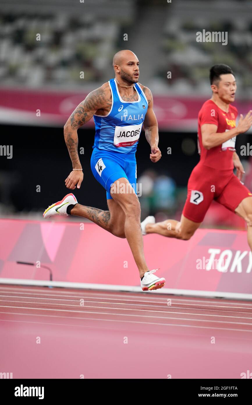 Marcell Jacobs running the 100 meters at the 2020 Tokyo Olympics Stock ...