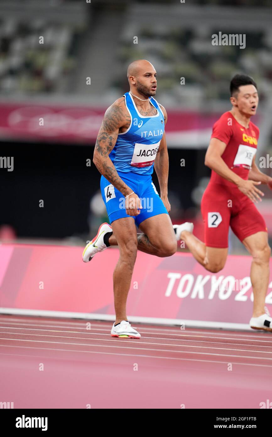 Marcell Jacobs running the 100 meters at the 2020 Tokyo Olympics Stock ...
