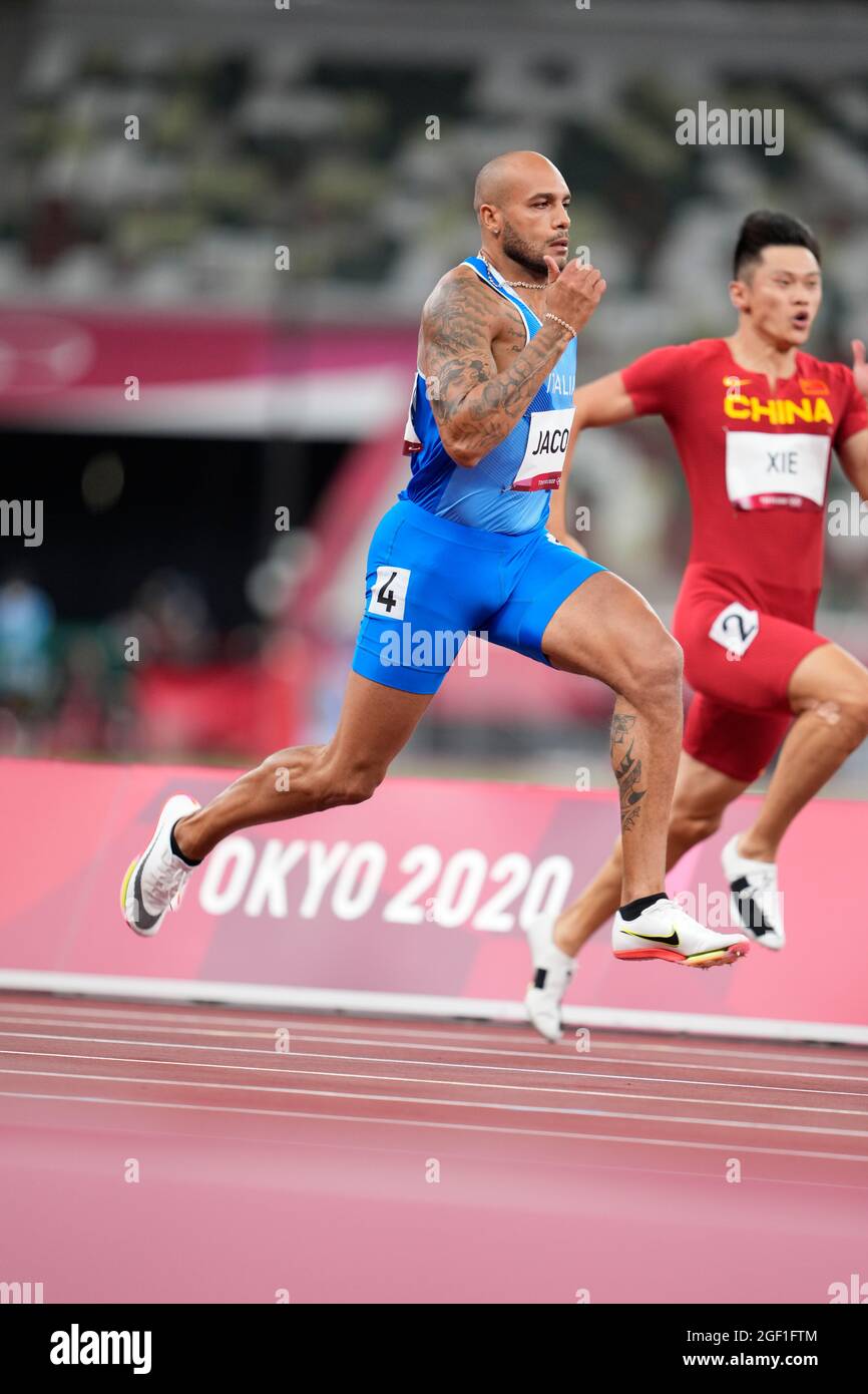 Marcell Jacobs running the 100 meters at the 2020 Tokyo Olympics Stock ...