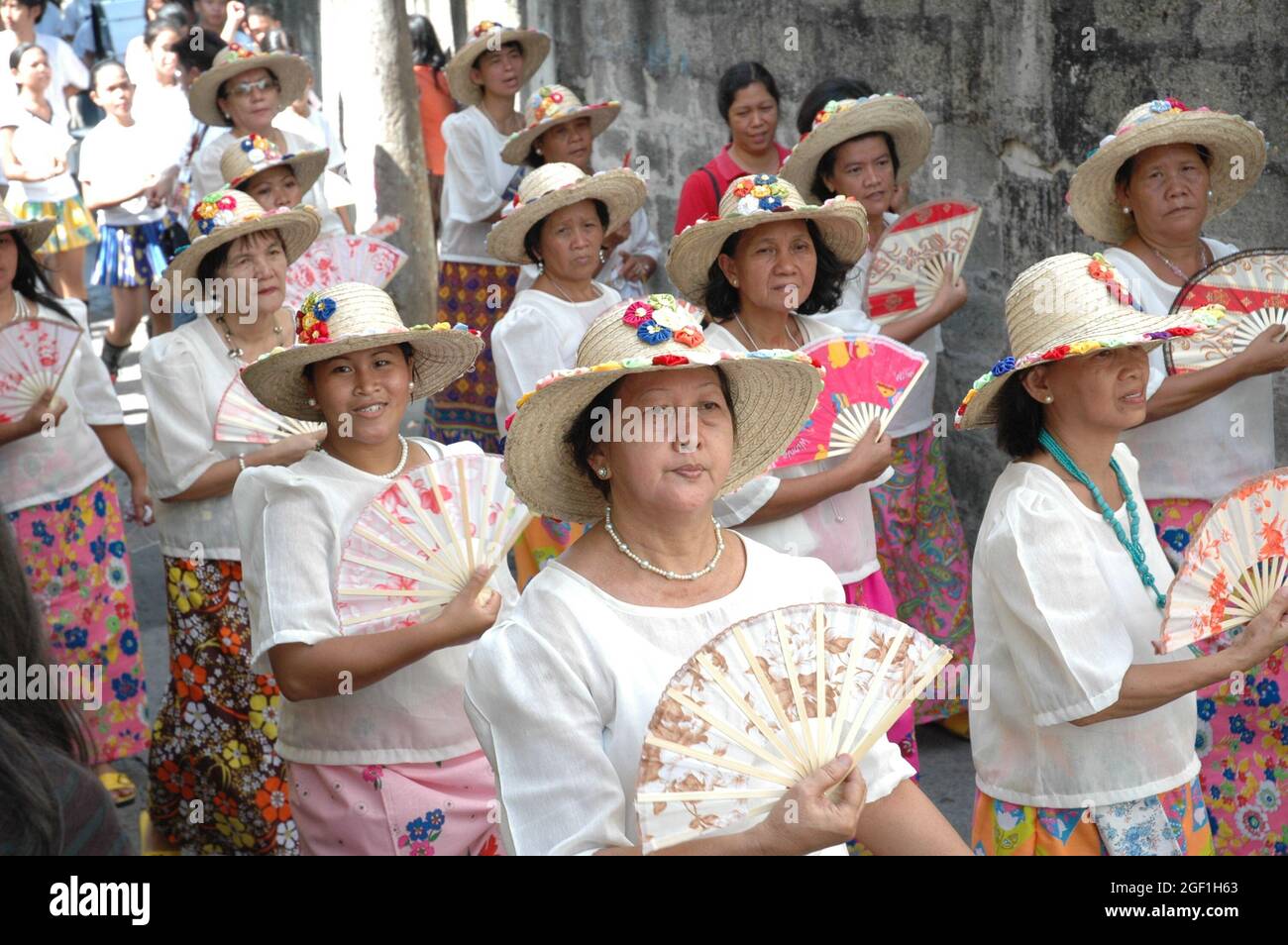 MANILA, PHILIPPINES - Oct 17, 2008: The women with traditional clothes ...
