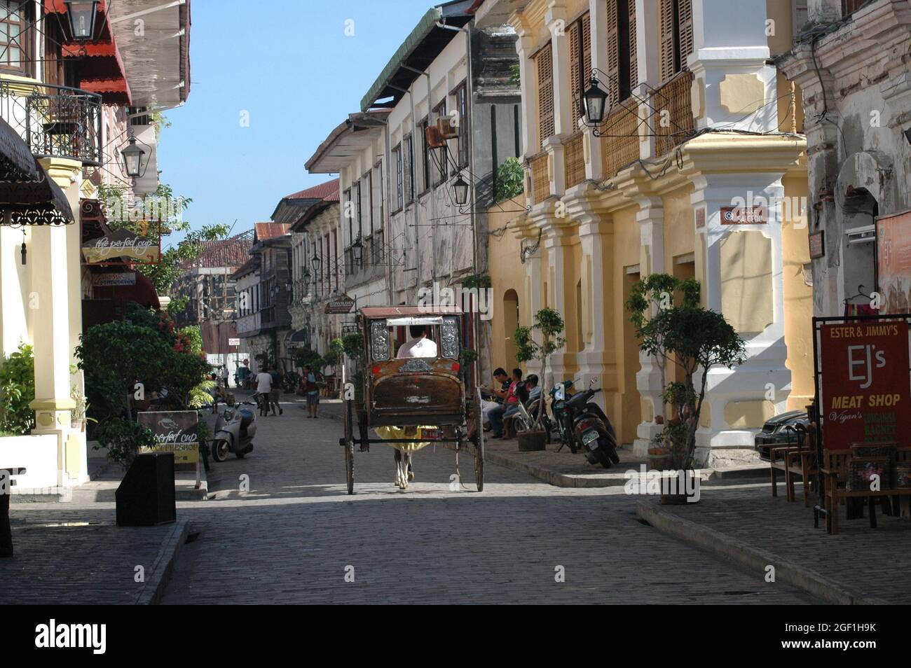 VIGAN, PHILIPPINES - Sep 30, 2010: A rear view of a horse cart driving ...
