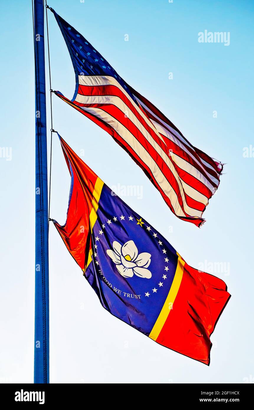 An American flag and the new Mississippi flag fly together on a flag ...