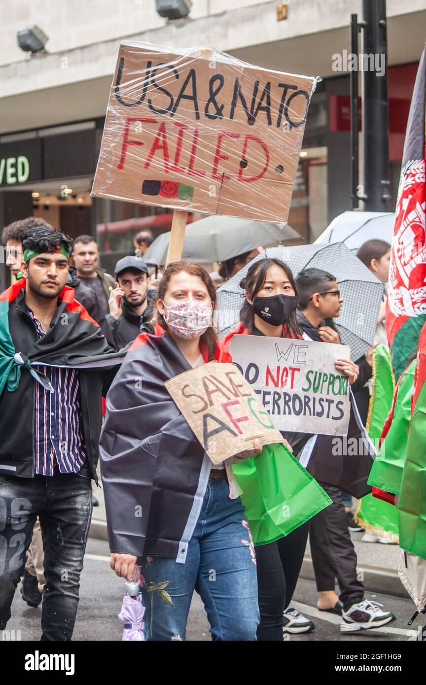 LONDON, ENGLAND- 21 August 2021: Protesters at a STOP KILLING AFGHANS ...