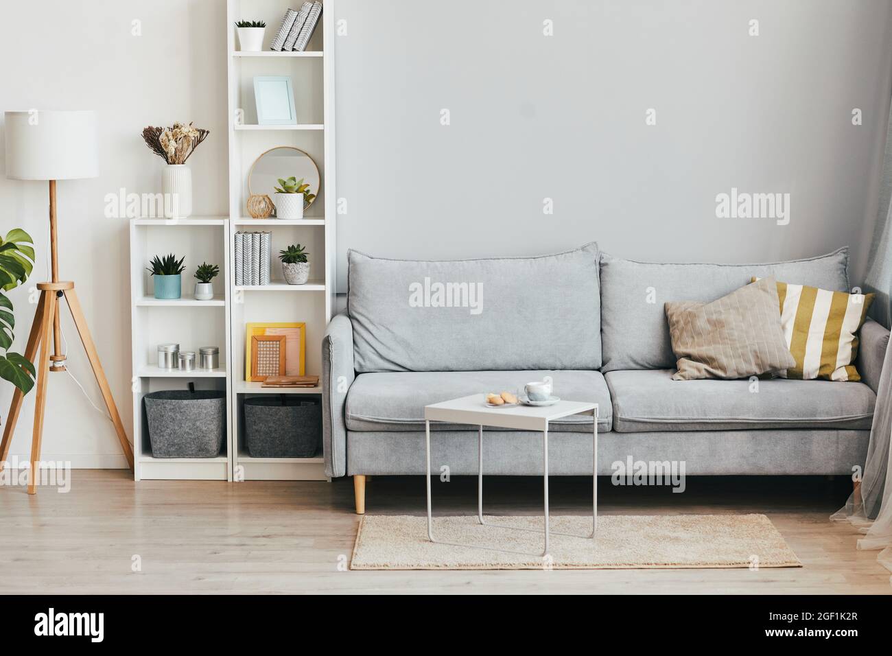 Minimal background image of cozy home interior with comfortable sofa in ...