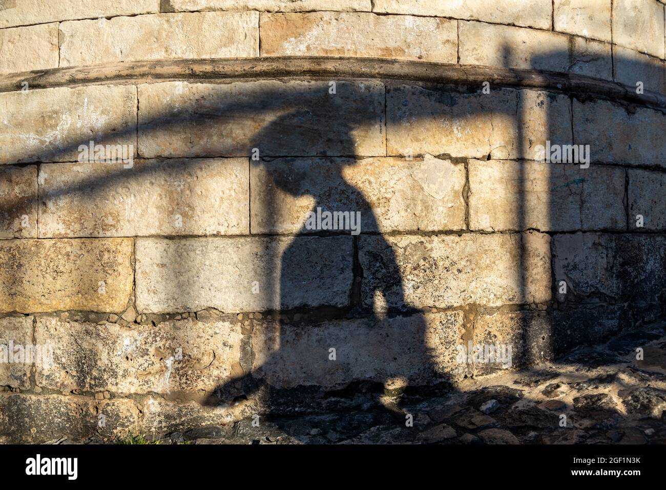 Two human shadows on street hi-res stock photography and images - Alamy