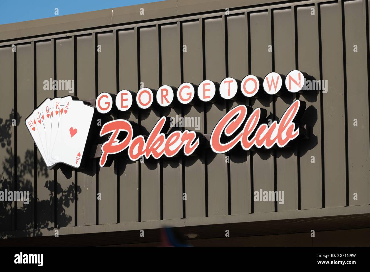 Sign over entrance to poker card game playing club Georgetown, Texas ...