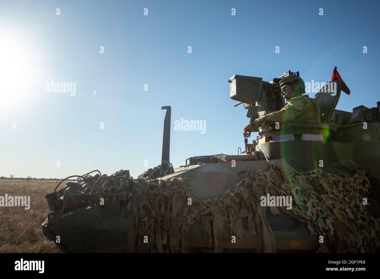 An Australian Army soldier with 1st Armored Regiment observes a firing ...