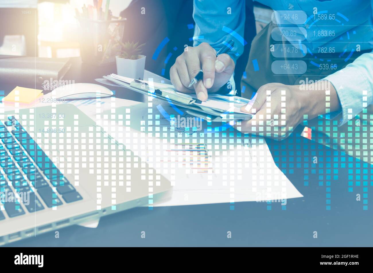 Businessman document paperwork graph and computer laptop. Business ...