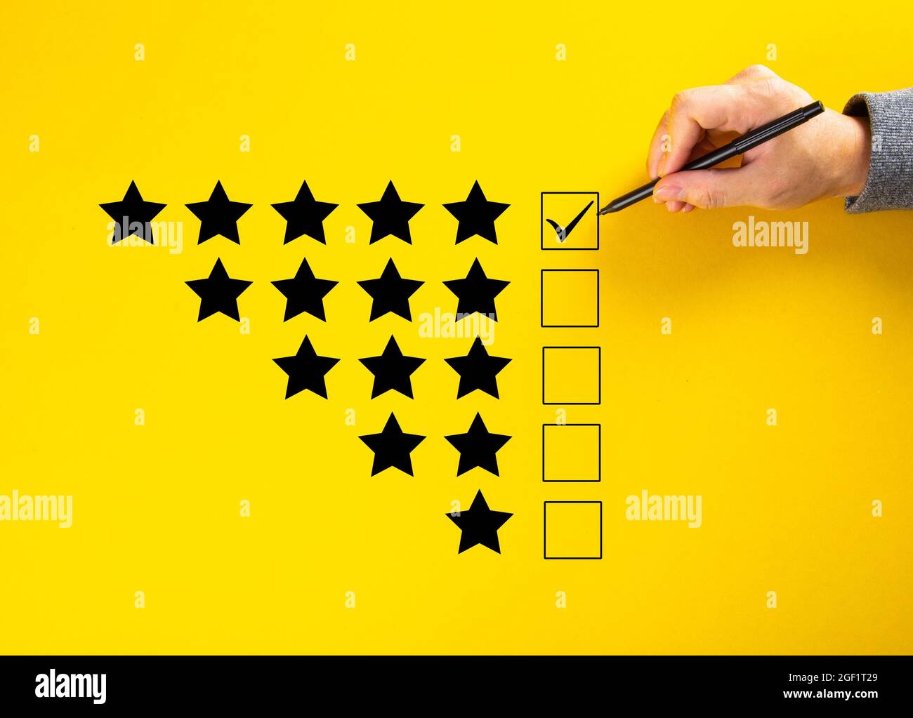 Hand putting a check on the 5 star rating. Survey Concept Stock Photo ...
